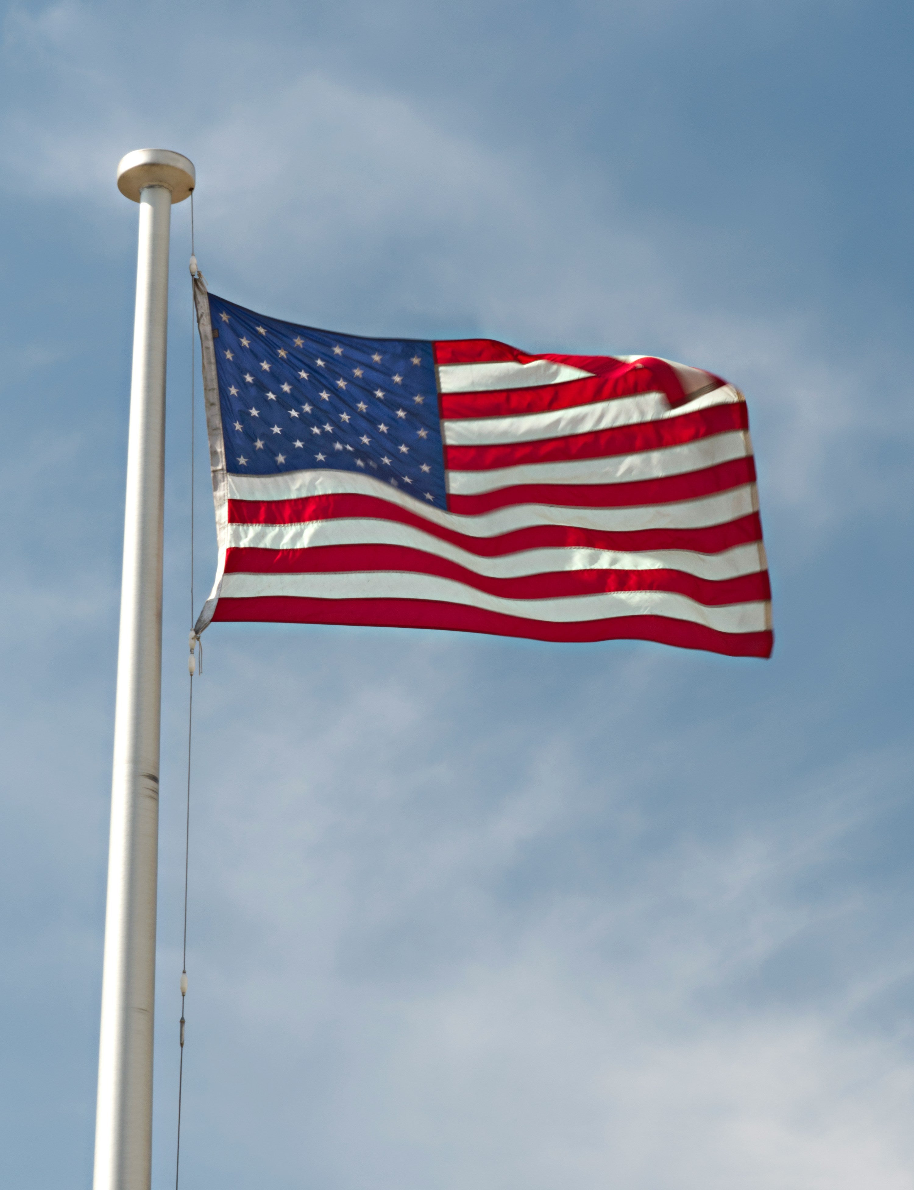 Top 5 Benefits of Installing a Flagpole at Your Business | Colonial Flag